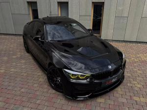 Black BMW M4 2020 in Riga, with an engine capacity of 3.00 L and mileage of 61 thousand km for 54000 €, photo 8 on AUTOMOTO.COM.LV