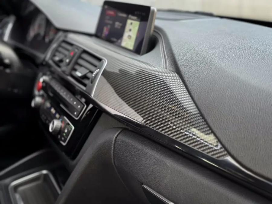 Black BMW M4 2020 in Riga, with an engine capacity of 3.00 L and mileage of 61 thousand km for 54000 €, photo 18 on AUTOMOTO.COM.LV