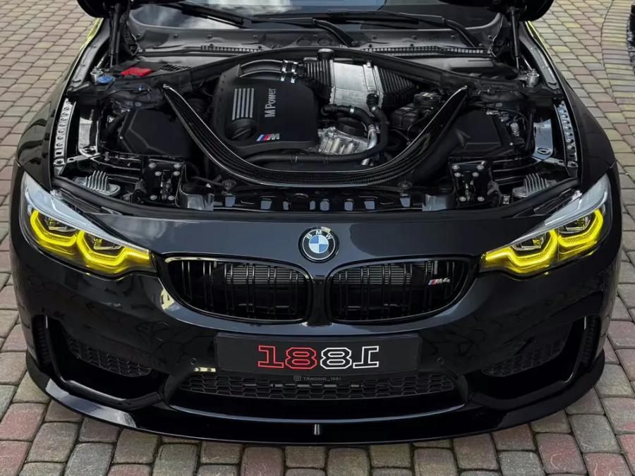 Black BMW M4 2020 in Riga, with an engine capacity of 3.00 L and mileage of 61 thousand km for 54000 €, photo 19 on AUTOMOTO.COM.LV