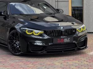 Black BMW M4 2020 in Riga, with an engine capacity of 3.00 L and mileage of 61 thousand km for 54000 €, photo 21 on AUTOMOTO.COM.LV