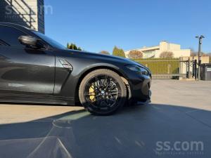 Black BMW M4 2021 in Riga, with an engine capacity of 3.00 L and mileage of 60 thousand km for 65900 €, photo 3 on AUTOMOTO.COM.LV