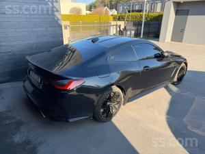 Black BMW M4 2021 in Riga, with an engine capacity of 3.00 L and mileage of 60 thousand km for 65900 €, photo 4 on AUTOMOTO.COM.LV