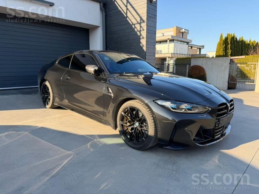 Black BMW M4 2021 in Riga, with an engine capacity of 3.00 L and mileage of 60 thousand km for 65900 €, photo 5 on AUTOMOTO.COM.LV