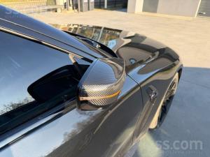 Black BMW M4 2021 in Riga, with an engine capacity of 3.00 L and mileage of 60 thousand km for 65900 €, photo 6 on AUTOMOTO.COM.LV
