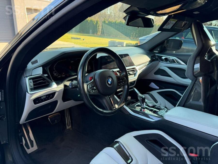 Black BMW M4 2021 in Riga, with an engine capacity of 3.00 L and mileage of 60 thousand km for 65900 €, photo 8 on AUTOMOTO.COM.LV
