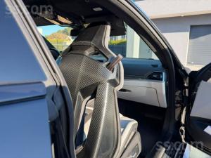 Black BMW M4 2021 in Riga, with an engine capacity of 3.00 L and mileage of 60 thousand km for 65900 €, photo 9 on AUTOMOTO.COM.LV