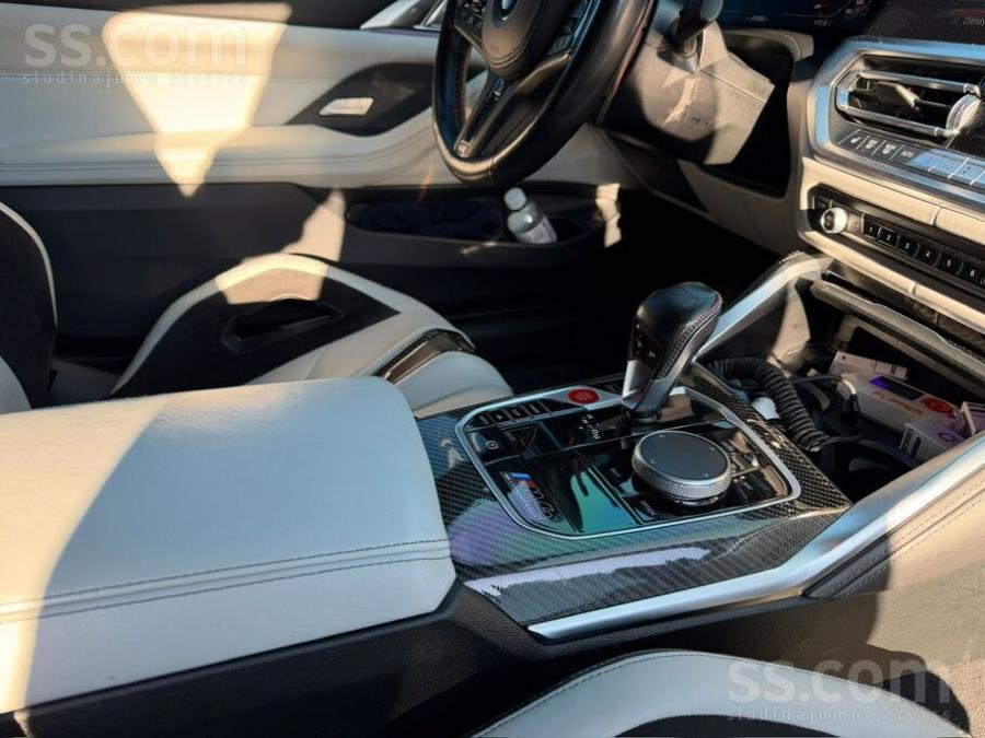 Black BMW M4 2021 in Riga, with an engine capacity of 3.00 L and mileage of 60 thousand km for 65900 €, photo 10 on AUTOMOTO.COM.LV