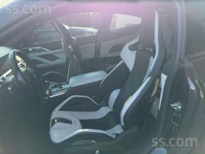 Black BMW M4 2021 in Riga, with an engine capacity of 3.00 L and mileage of 60 thousand km for 65900 €, photo 11 on AUTOMOTO.COM.LV