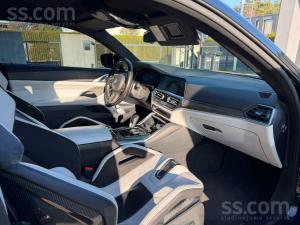 Black BMW M4 2021 in Riga, with an engine capacity of 3.00 L and mileage of 60 thousand km for 65900 €, photo 13 on AUTOMOTO.COM.LV