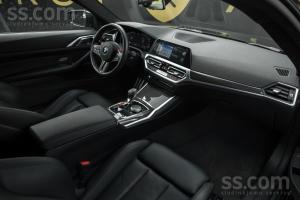 Black BMW M4 2022 in Tukums, with an engine capacity of 3.00 L and mileage of 68 thousand km for 69990 €, photo 6 on AUTOMOTO.COM.LV