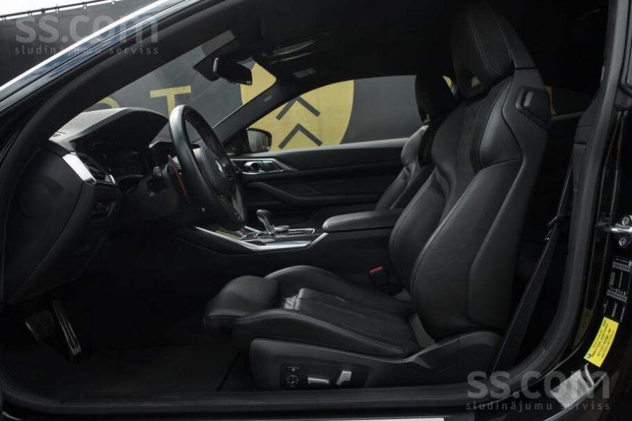 Black BMW M4 2022 in Tukums, with an engine capacity of 3.00 L and mileage of 68 thousand km for 69990 €, photo 7 on AUTOMOTO.COM.LV