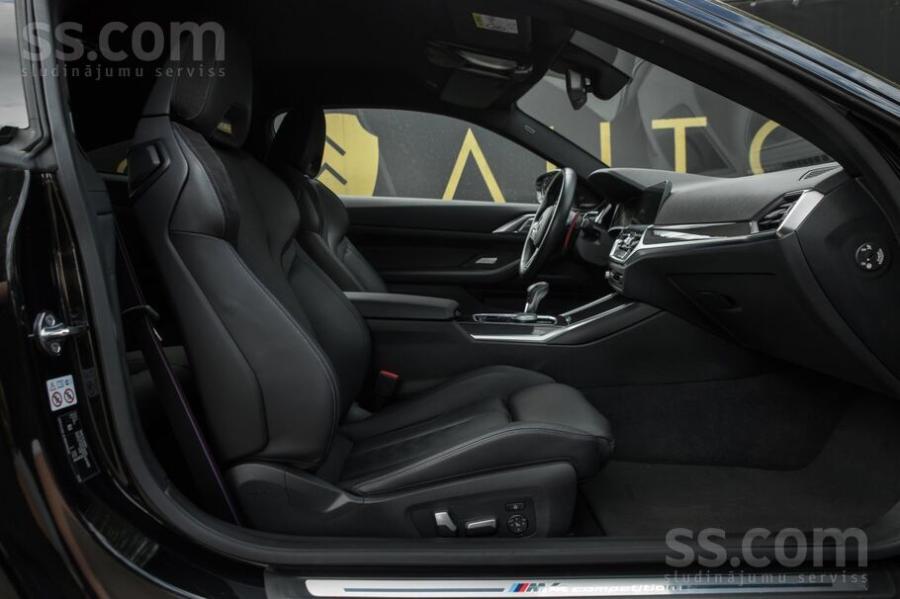 Black BMW M4 2022 in Tukums, with an engine capacity of 3.00 L and mileage of 68 thousand km for 69990 €, photo 8 on AUTOMOTO.COM.LV