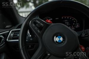 Black BMW M4 2022 in Tukums, with an engine capacity of 3.00 L and mileage of 68 thousand km for 69990 €, photo 12 on AUTOMOTO.COM.LV