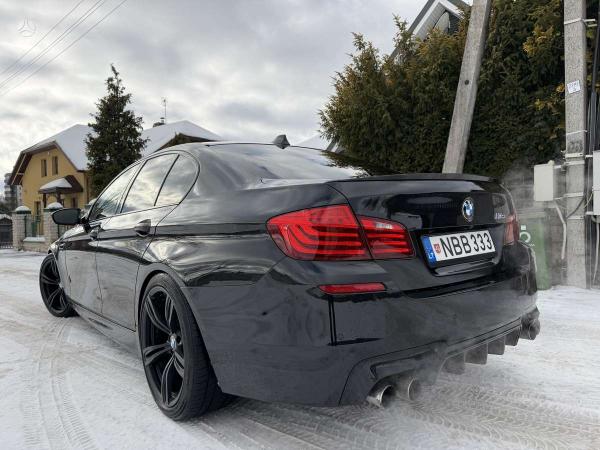 Black BMW M5 2013 in Kaunas, with an engine capacity of 4.40 L and mileage of 94 thousand km for 29500 €, photo 10 on AUTOMOTO.COM.LV