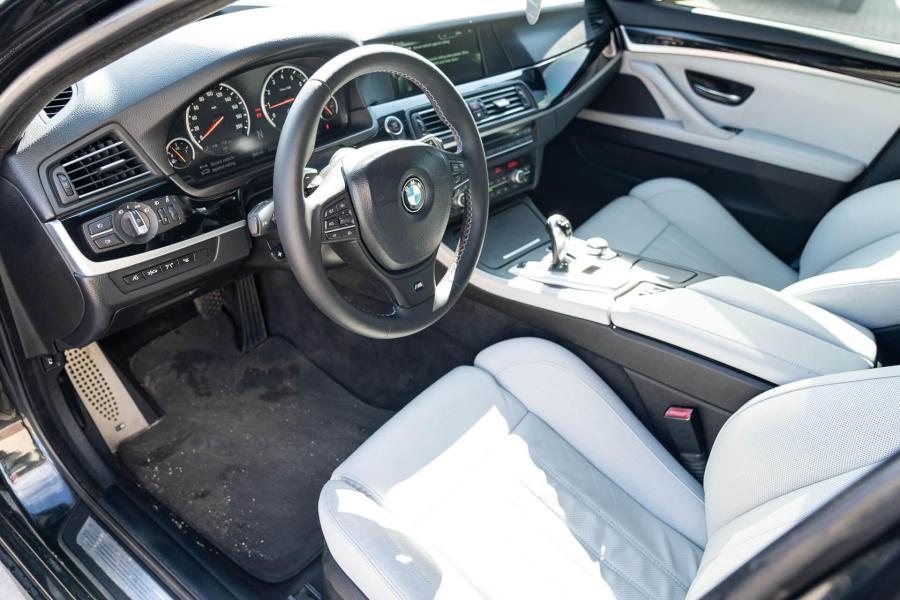 Black BMW M5 2013 in Riga, with an engine capacity of 4.40 L and mileage of 285 thousand km for 26900 €, photo 10 on AUTOMOTO.COM.LV