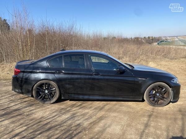 Black BMW M5 2014 in Vilnius, with an engine capacity of 4.40 L and mileage of 96 thousand km for 40000 €, photo 5 on AUTOMOTO.COM.LV