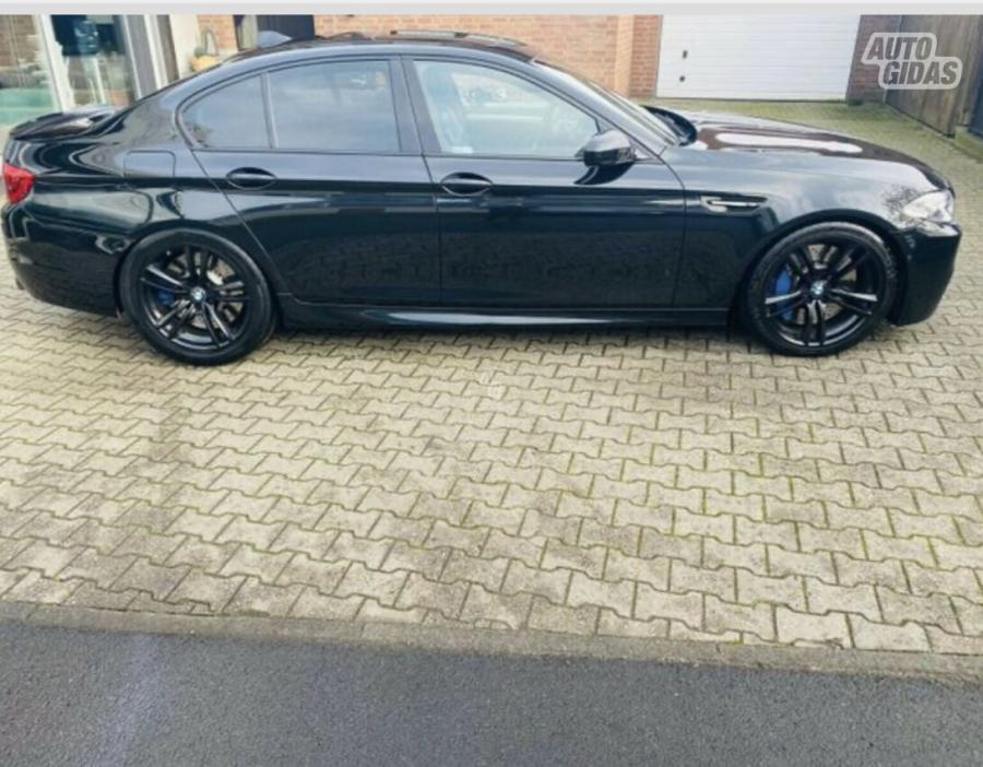 Black BMW M5 2014 in Vilnius, with an engine capacity of 4.40 L and mileage of 96 thousand km for 40000 €, photo 14 on AUTOMOTO.COM.LV