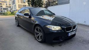 Black BMW M5 2014 in Ukmerge, with an engine capacity of 4.40 L and mileage of 148 thousand km for 24500 €, photo 3 on AUTOMOTO.COM.LV