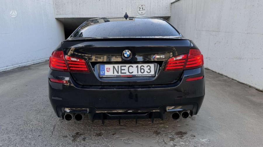 Black BMW M5 2014 in Ukmerge, with an engine capacity of 4.40 L and mileage of 148 thousand km for 24500 €, photo 7 on AUTOMOTO.COM.LV
