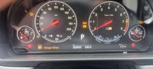 Black BMW M5 2015 in Vilnius, with an engine capacity of 4.40 L and mileage of 203 thousand km for 15900 €, photo 12 on AUTOMOTO.COM.LV