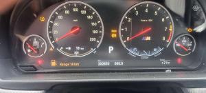 Black BMW M5 2015 in Vilnius, with an engine capacity of 4.40 L and mileage of 203 thousand km for 15800 €, photo 12 on AUTOMOTO.COM.LV