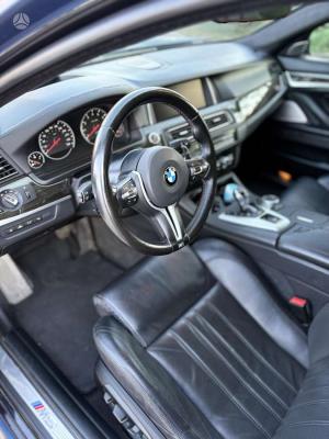 Blue BMW M5 2015 in Kaunas, with an engine capacity of 4.40 L and mileage of 96 thousand km for 29900 €, photo 19 on AUTOMOTO.COM.LV