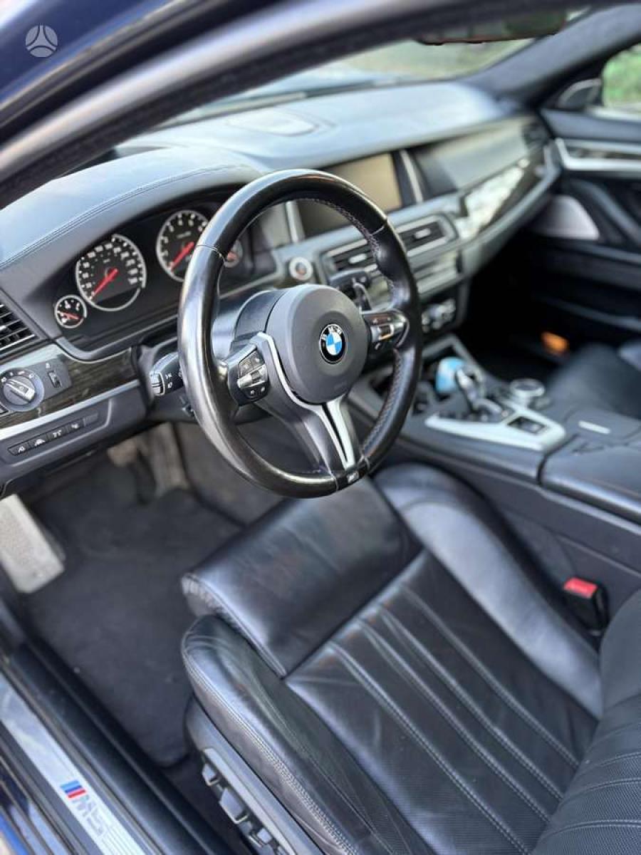 Blue BMW M5 2015 in Kaunas, with an engine capacity of 4.40 L and mileage of 96 thousand km for 29900 €, photo 19 on AUTOMOTO.COM.LV