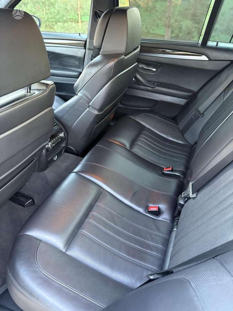 Blue BMW M5 2015 in Kaunas, with an engine capacity of 4.40 L and mileage of 96 thousand km for 29900 €, photo 20 on AUTOMOTO.COM.LV