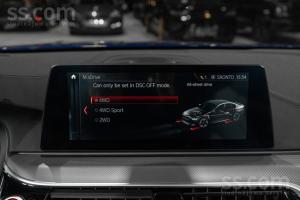 Blue BMW M5 2019 in Riga, with an engine capacity of 4.40 L and mileage of 71 thousand km for 64600 €, photo 32 on AUTOMOTO.COM.LV