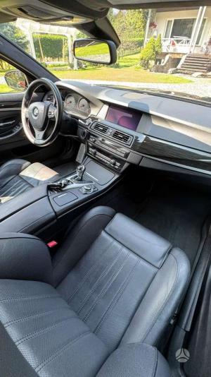 Grey BMW M5 2013 in Varena, with an engine capacity of 4.40 L and mileage of 168 thousand km for 18500 €, photo 16 on AUTOMOTO.COM.LV