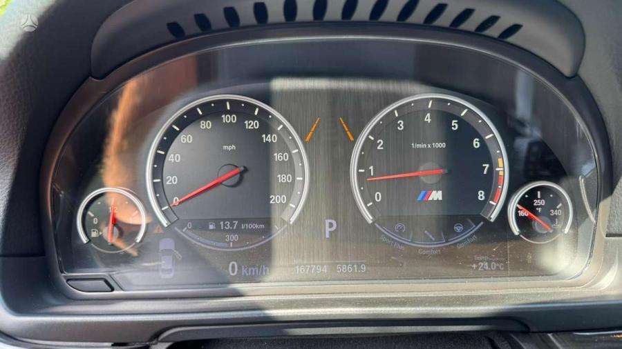 Grey BMW M5 2013 in Varena, with an engine capacity of 4.40 L and mileage of 168 thousand km for 18500 €, photo 23 on AUTOMOTO.COM.LV