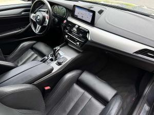 Grey BMW M5 2018 in Vilnius, with an engine capacity of 4.40 L and mileage of 212 thousand km for 36999 €, photo 12 on AUTOMOTO.COM.LV