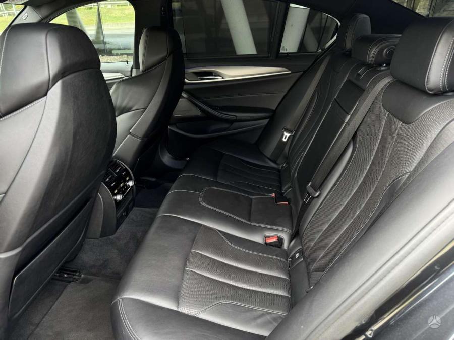 Grey BMW M5 2018 in Vilnius, with an engine capacity of 4.40 L and mileage of 212 thousand km for 36999 €, photo 16 on AUTOMOTO.COM.LV