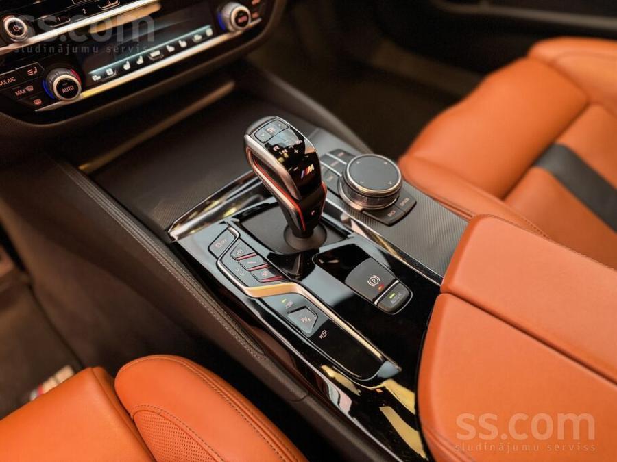 Grey BMW M5 2019 in Riga, with an engine capacity of 4.40 L and mileage of 108 thousand km for 59990 €, photo 15 on AUTOMOTO.COM.LV