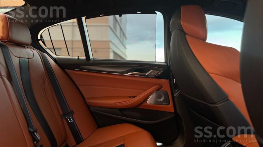Grey BMW M5 2019 in Riga, with an engine capacity of 4.40 L and mileage of 108 thousand km for 59990 €, photo 21 on AUTOMOTO.COM.LV