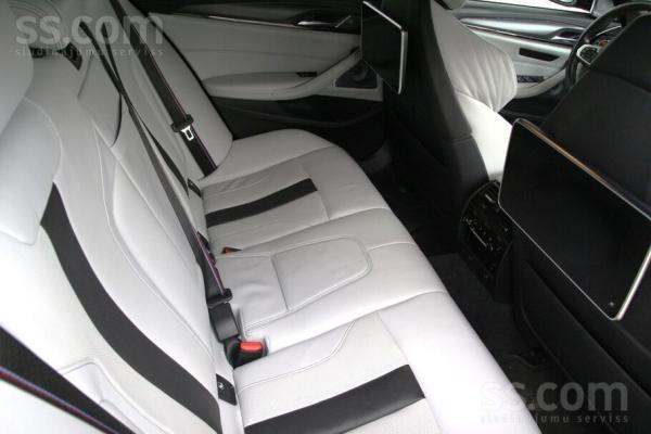 Red BMW M5 2018 in Riga, with an engine capacity of 4.40 L and mileage of 93 thousand km for 53900 €, photo 11 on AUTOMOTO.COM.LV