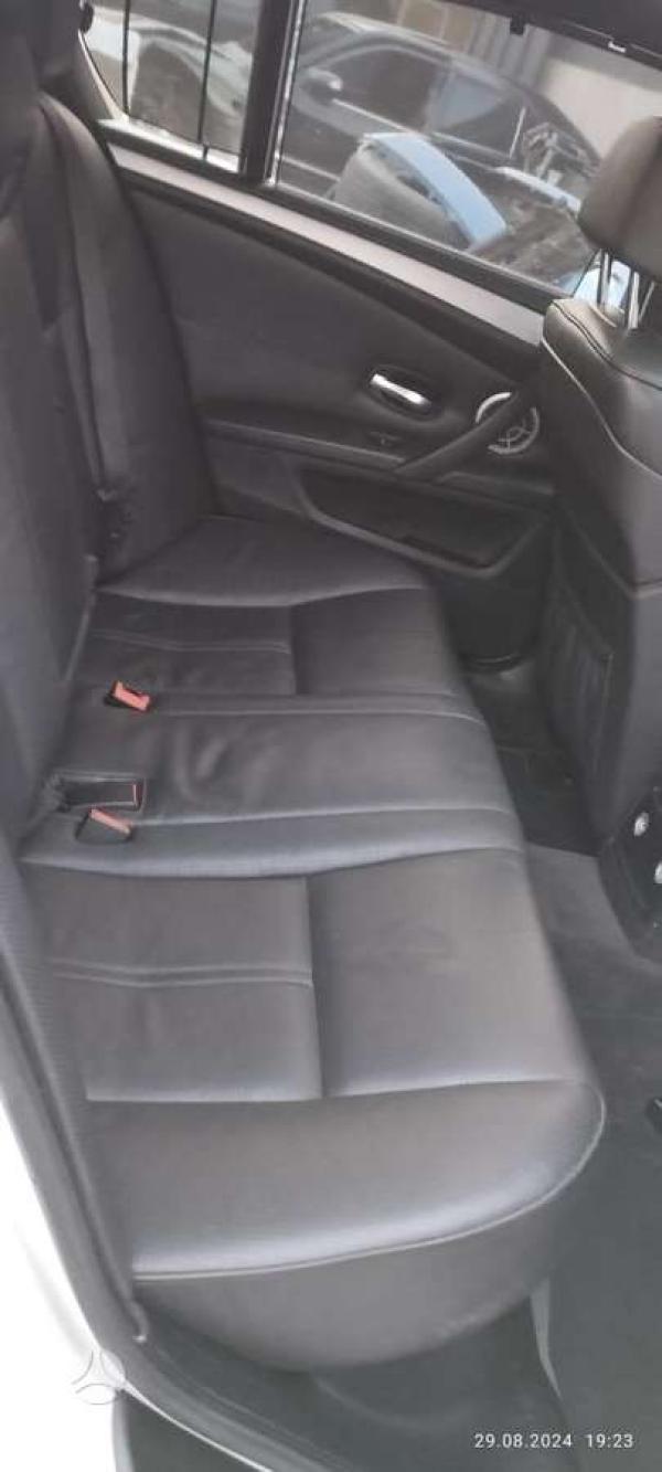 White BMW M5 2008 in Vilnius, with an engine capacity of 5.00 L and mileage of 142 thousand km for 26000 €, photo 8 on AUTOMOTO.COM.LV