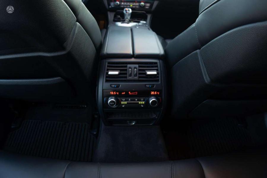 White BMW M5 2013 in Klaipeda, with an engine capacity of 4.40 L and mileage of 97 thousand km for 29500 €, photo 23 on AUTOMOTO.COM.LV