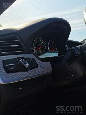 White BMW M5 2014 in Riga, with an engine capacity of 4.40 L and mileage of 105 thousand km for 33000 €, photo 11 on AUTOMOTO.COM.LV