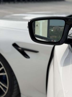 White BMW M5 2019 in Vilnius, with an engine capacity of 4.40 L and mileage of 65 thousand km for 50500 €, photo 18 on AUTOMOTO.COM.LV