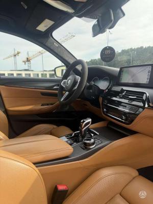 White BMW M5 2019 in Vilnius, with an engine capacity of 4.40 L and mileage of 65 thousand km for 50500 €, photo 23 on AUTOMOTO.COM.LV