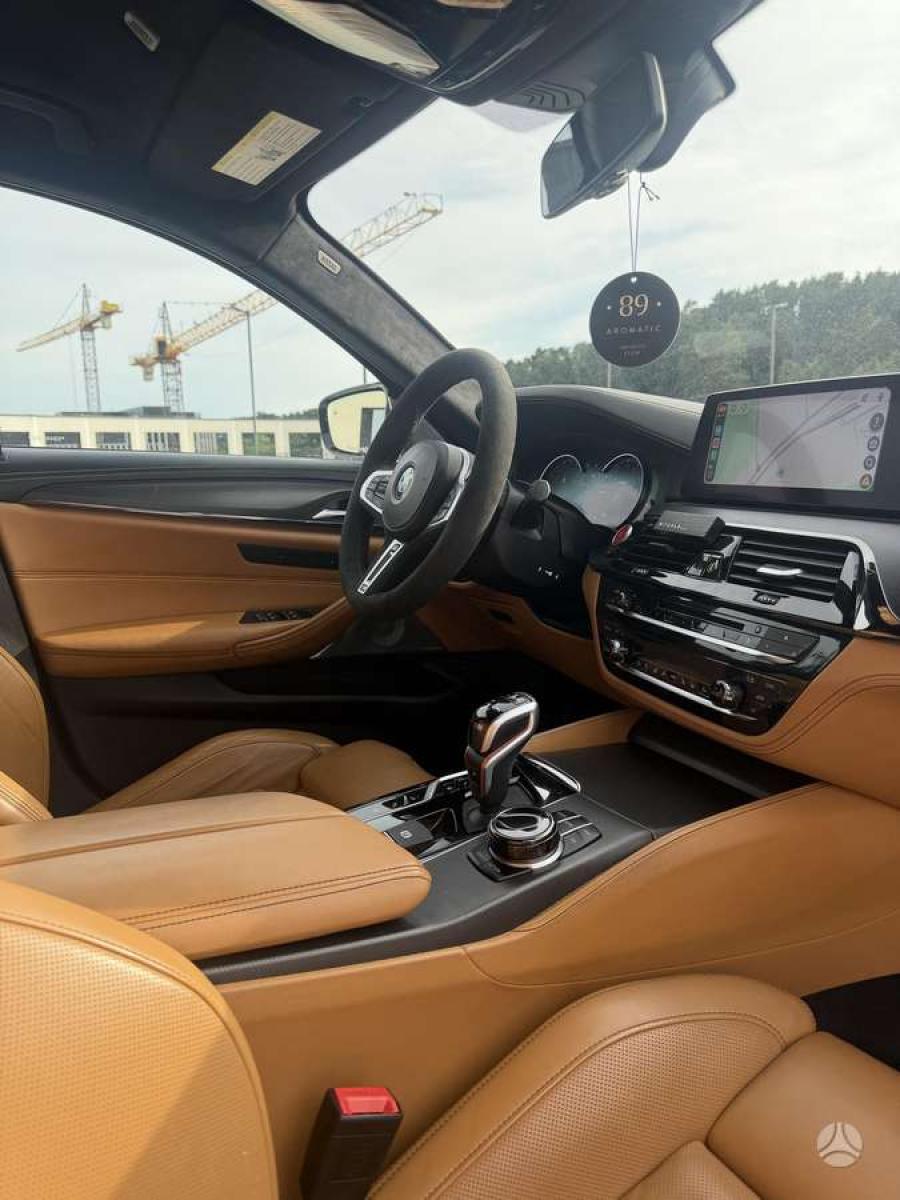 White BMW M5 2019 in Vilnius, with an engine capacity of 4.40 L and mileage of 65 thousand km for 50500 €, photo 23 on AUTOMOTO.COM.LV