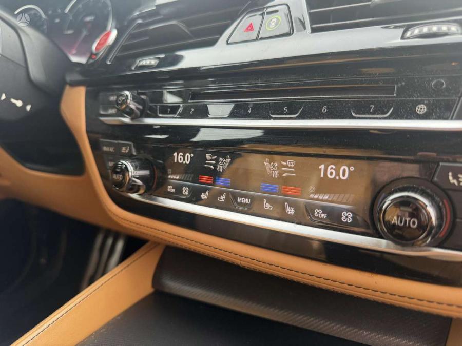 White BMW M5 2019 in Vilnius, with an engine capacity of 4.40 L and mileage of 65 thousand km for 50500 €, photo 26 on AUTOMOTO.COM.LV