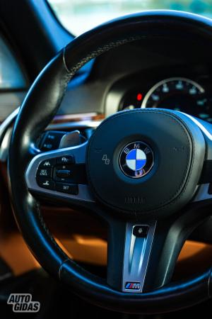 Blue BMW M550 2018 in Kaunas, with an engine capacity of 4.40 L and mileage of 100 thousand km for 28300 €, photo 19 on AUTOMOTO.COM.LV