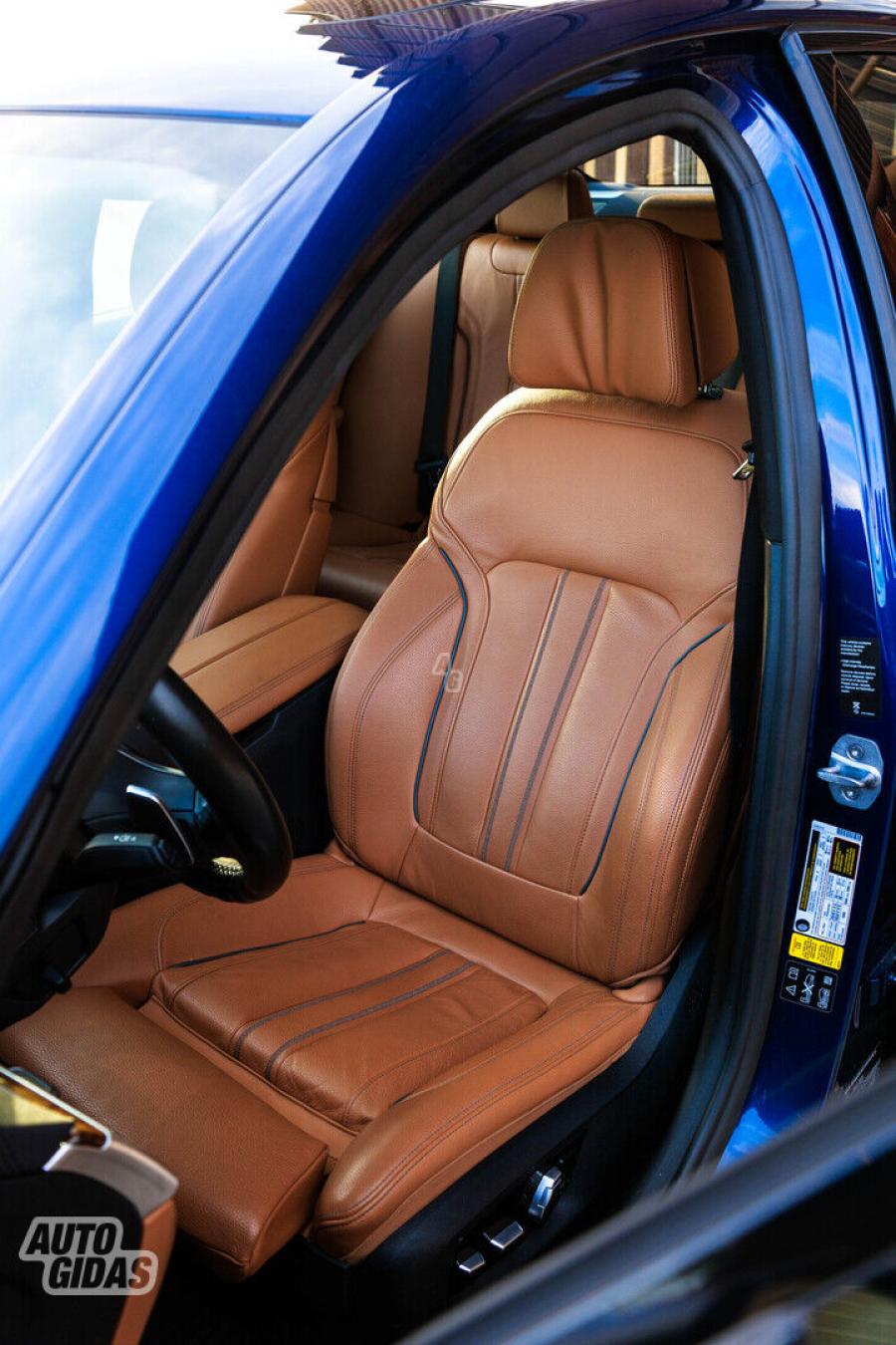 Blue BMW M550 2018 in Kaunas, with an engine capacity of 4.40 L and mileage of 100 thousand km for 28300 €, photo 22 on AUTOMOTO.COM.LV