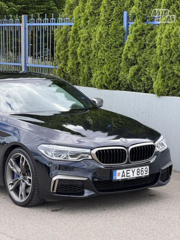 Blue BMW M550 2018 in Vilnius, with an engine capacity of 4.40 L and mileage of 226 thousand km for 27000 €, photo 6 on AUTOMOTO.COM.LV