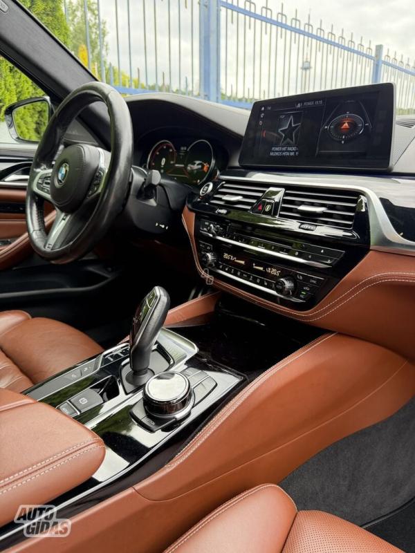 Blue BMW M550 2018 in Vilnius, with an engine capacity of 4.40 L and mileage of 226 thousand km for 27000 €, photo 10 on AUTOMOTO.COM.LV