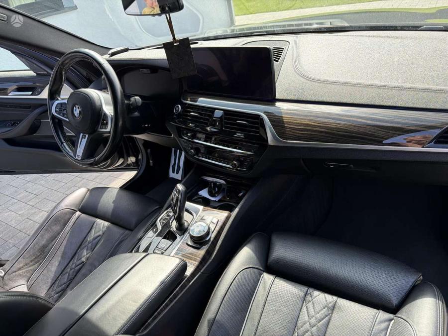 Blue BMW M550 2021 in Klaipeda, with an engine capacity of 4.40 L and mileage of 106 thousand km for 38000 €, photo 20 on AUTOMOTO.COM.LV
