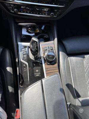 Blue BMW M550 2021 in Klaipeda, with an engine capacity of 4.40 L and mileage of 106 thousand km for 38000 €, photo 23 on AUTOMOTO.COM.LV