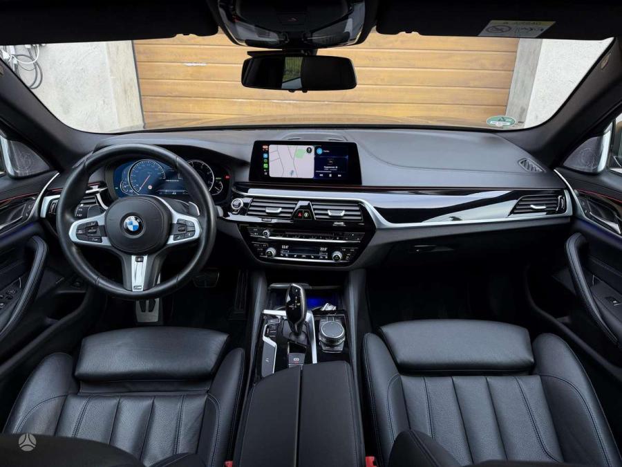 Grey BMW M550 2019 in Siauliai, with an engine capacity of 2.99 L and mileage of 114 thousand km for 29990 €, photo 16 on AUTOMOTO.COM.LV